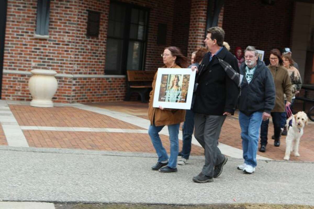 Family, friends and neighbors still seeking answers in murder of ...