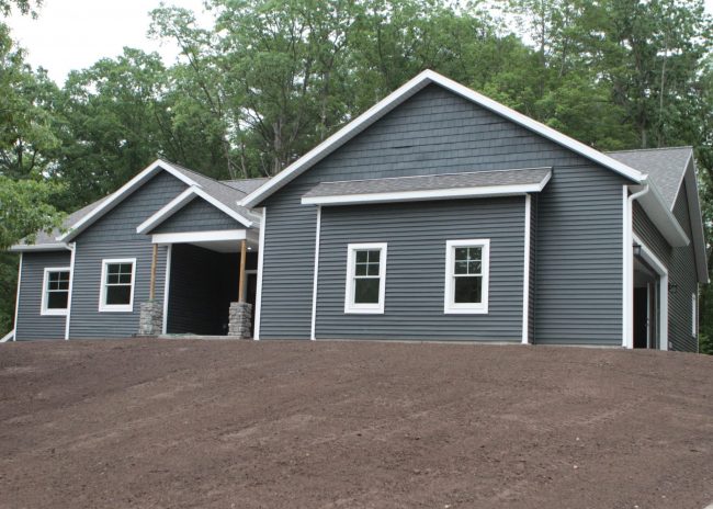 MOCC construction trades students near completion on house build
