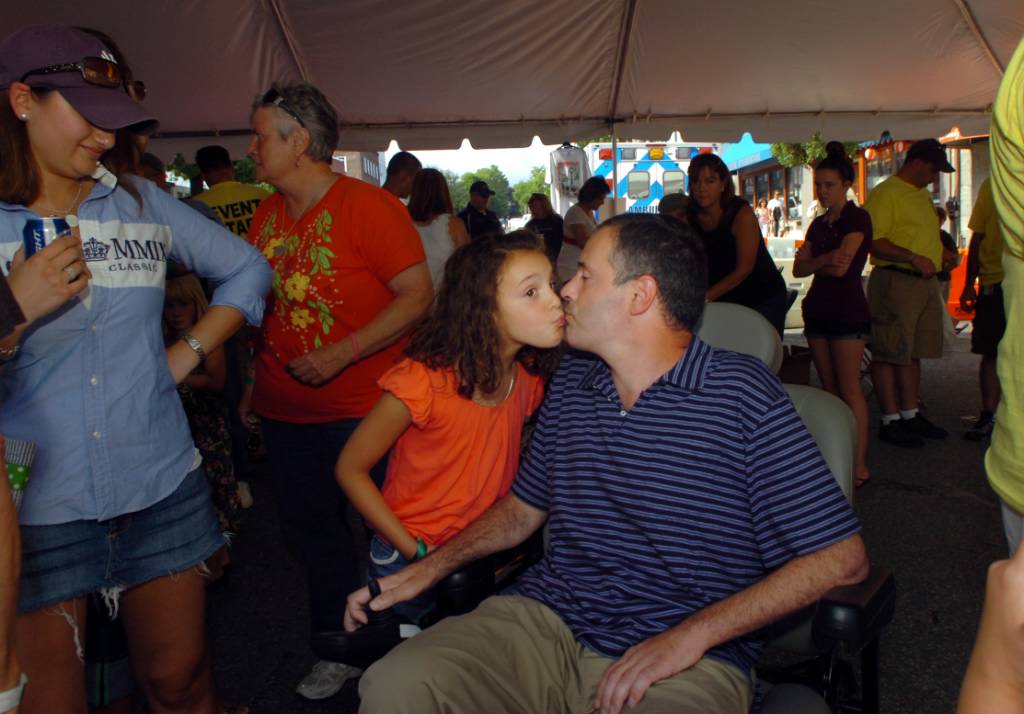 Block party draws hundreds in support of ailing officer