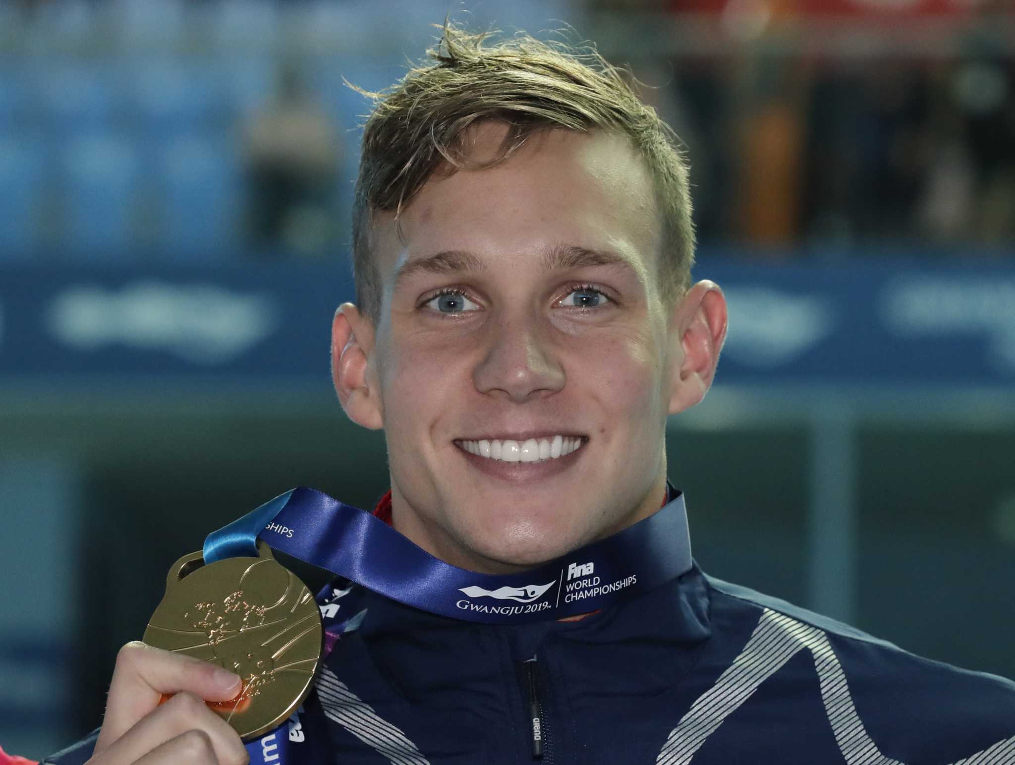 Dressel adds 3 golds at swimming worlds