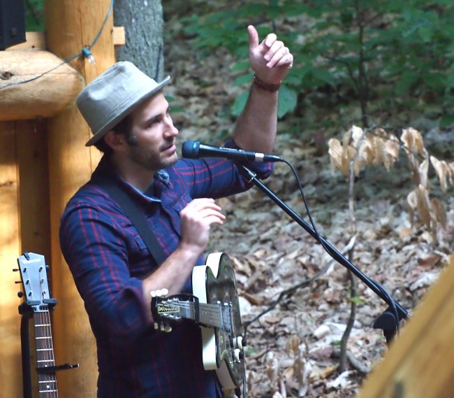 It's story-telling: Folk singer Joshua Davis warms Legacy Art Park audience
