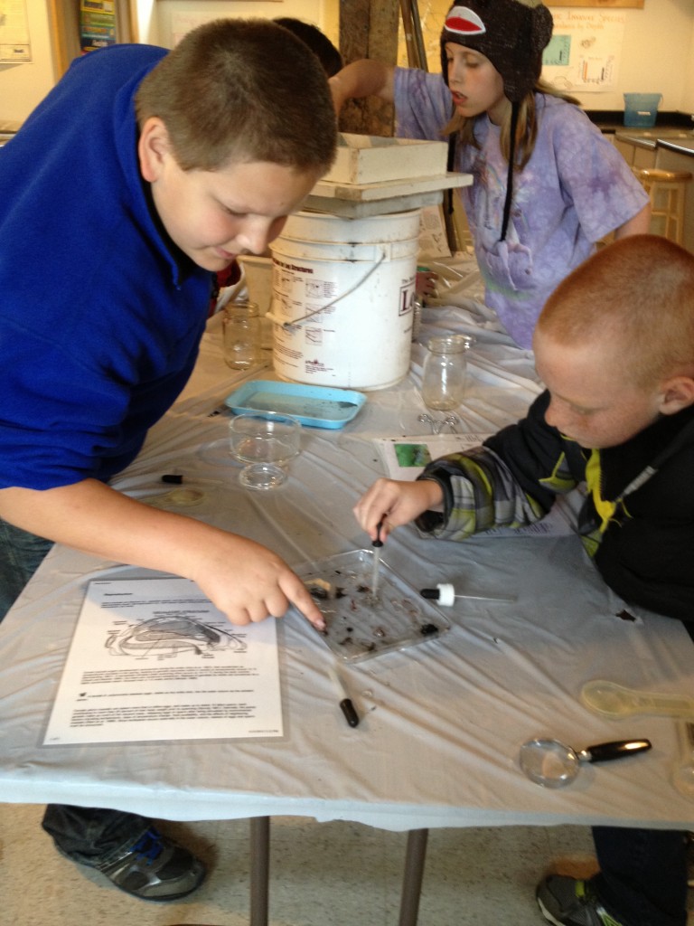 Onekama Consolidated Schools students board the Inland Seas