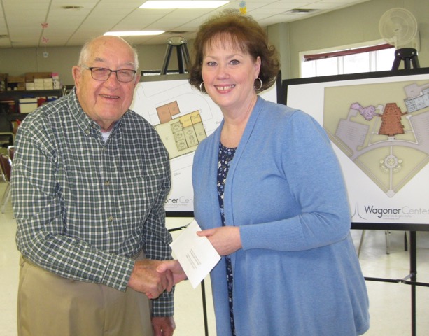 Men Who Care donate to Wagoner Center Patio Project