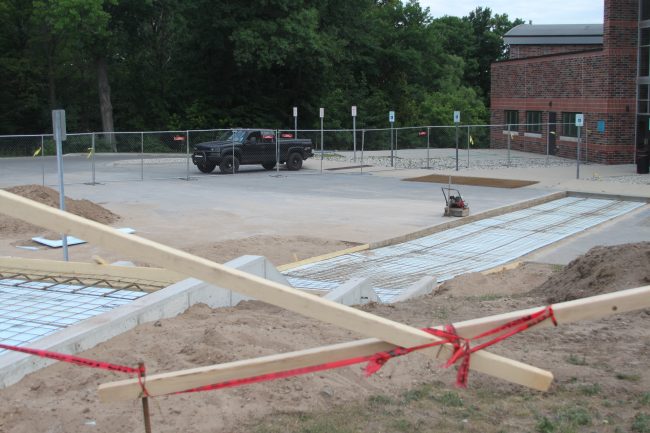 Onekama Board given tour of school construction project