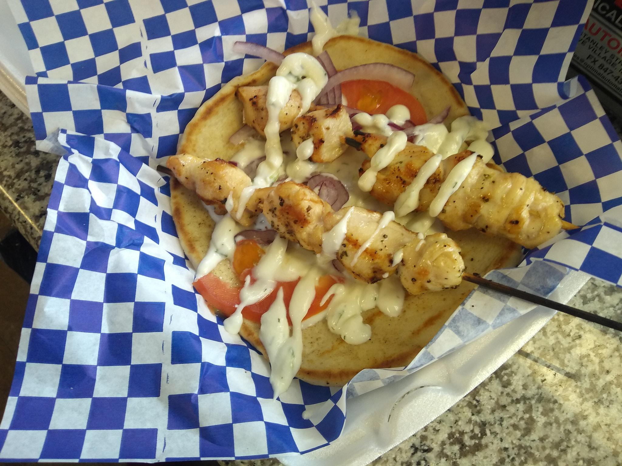 Gyros, falafels and hummus on the menu of Taste of Greek food truck in ...