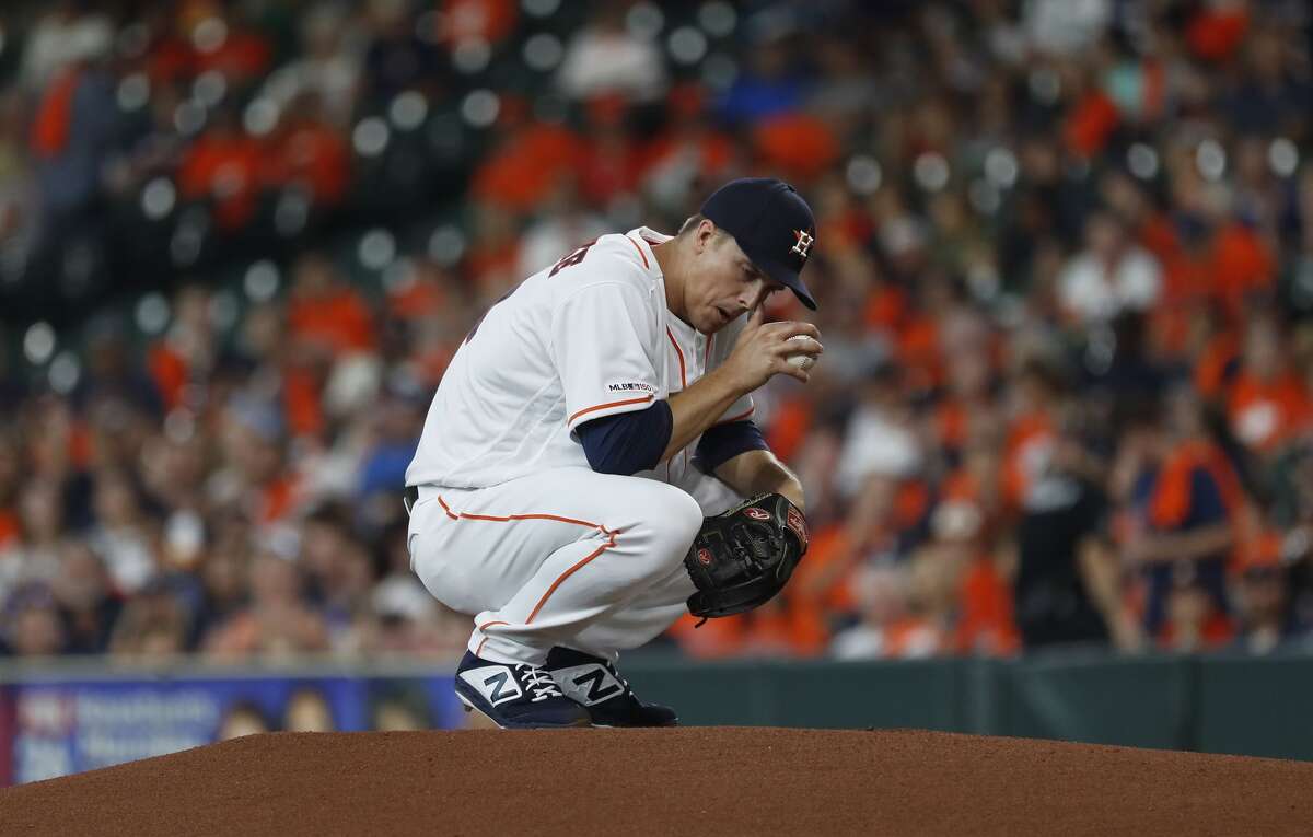 Astros rout Rockies, pick up Zack Greinke in his debut