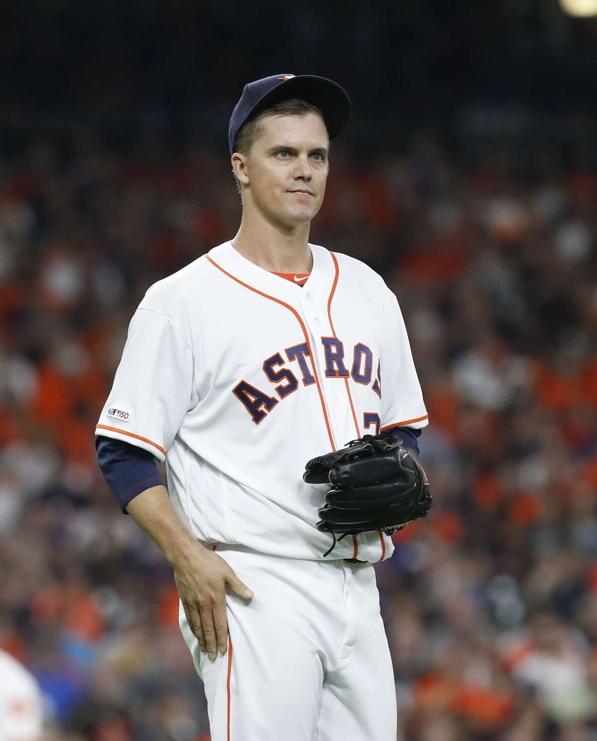 Astros rout Rockies, pick up Zack Greinke in his debut