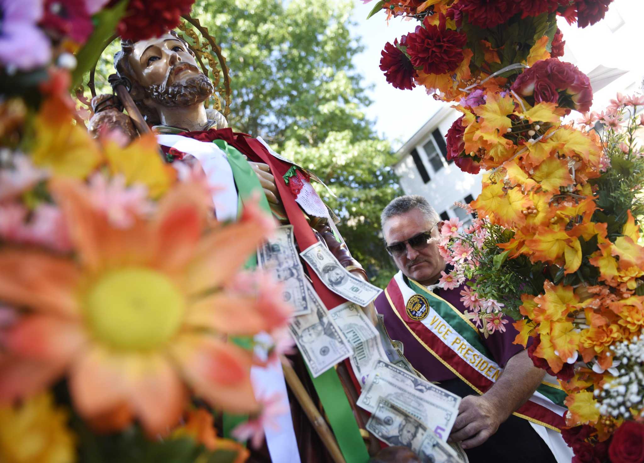 St. Roch Procession winds through streets of Greenwich