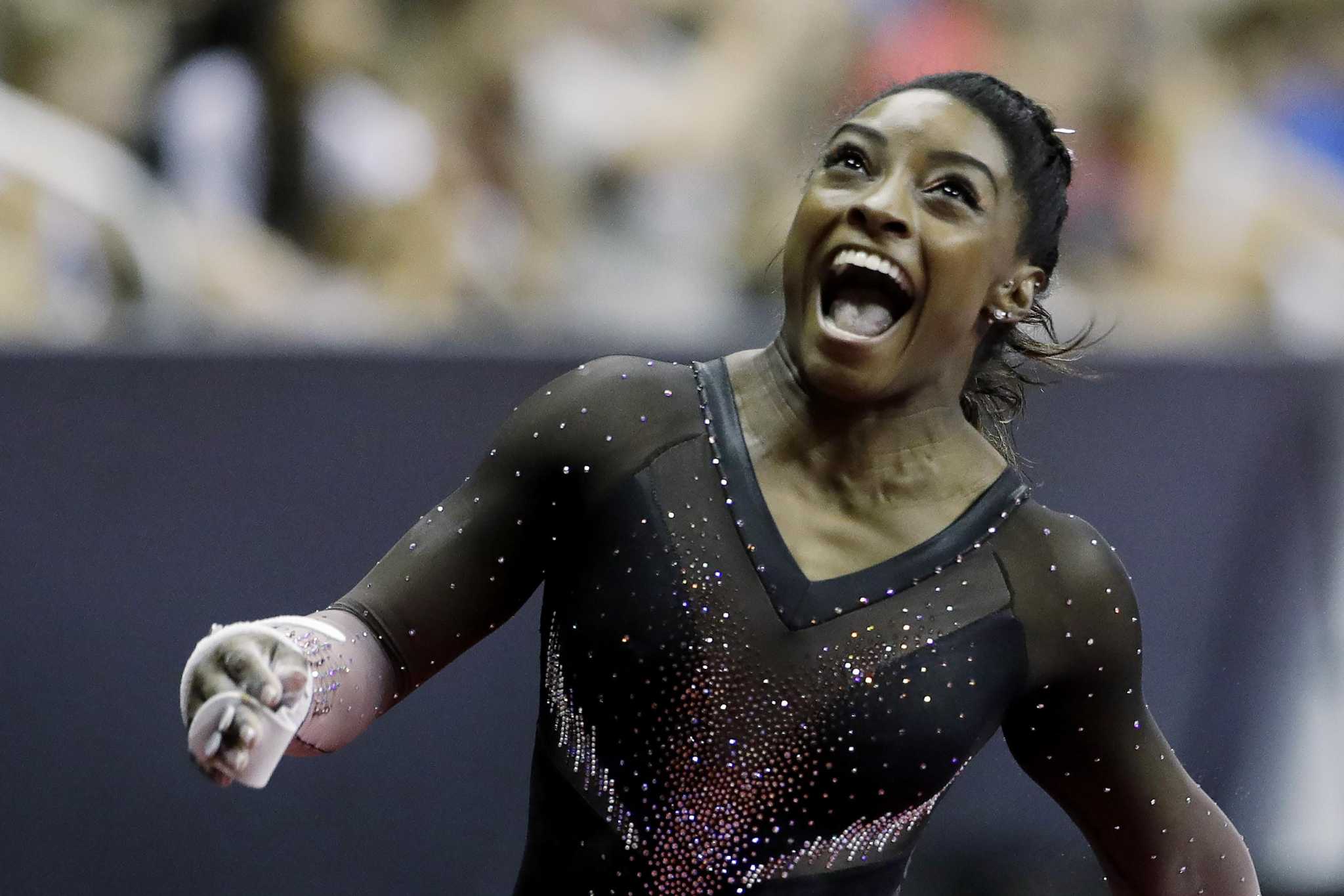 Simone Biles’ 6th national title comes with triple twist