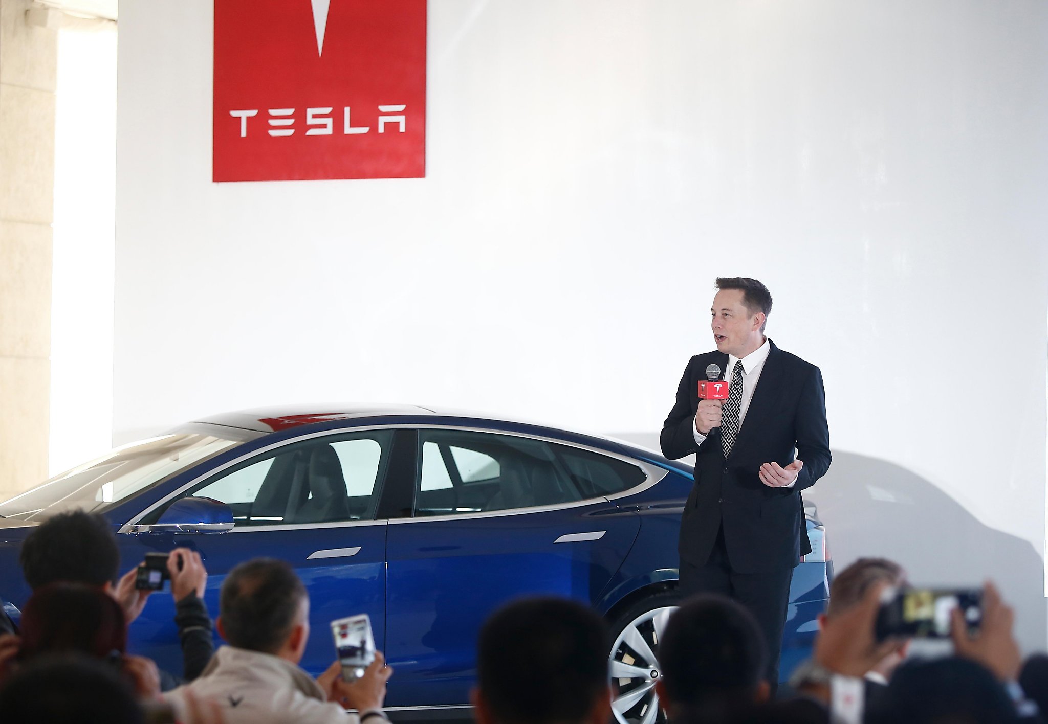 Tesla has a huge incentive to deploy self-driving tech. Is the world ready?
