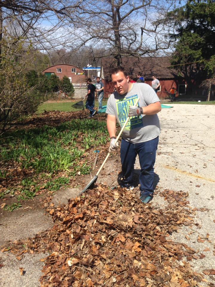 Track teams help with spring cleanup