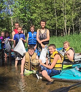 Boy Scouts clean river