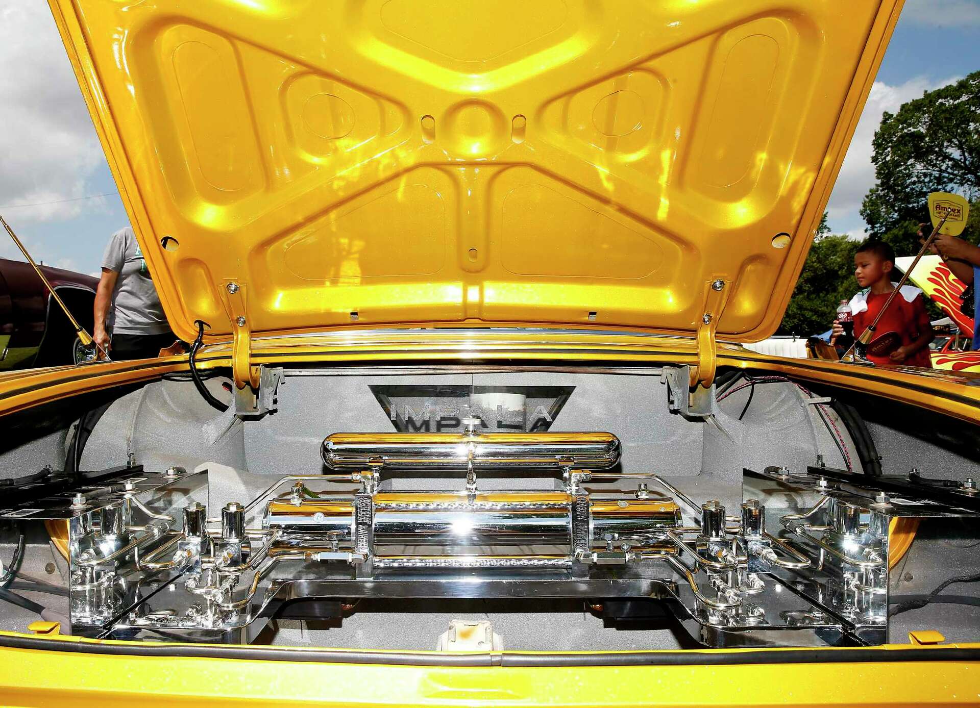 Sunshine, barbecue and lowriders — Houston car aficionados meet up at ...