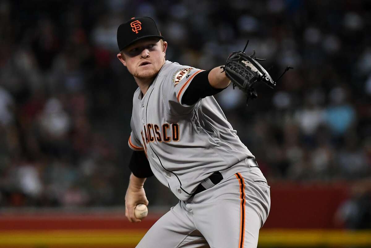 Giants roll D’backs as 22-year-old Logan Webb wins debut, Belt hits ...