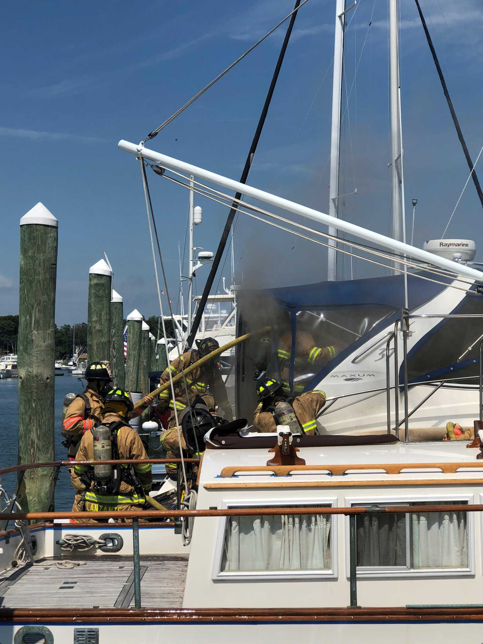 Fire damages boat in Milford Harbor