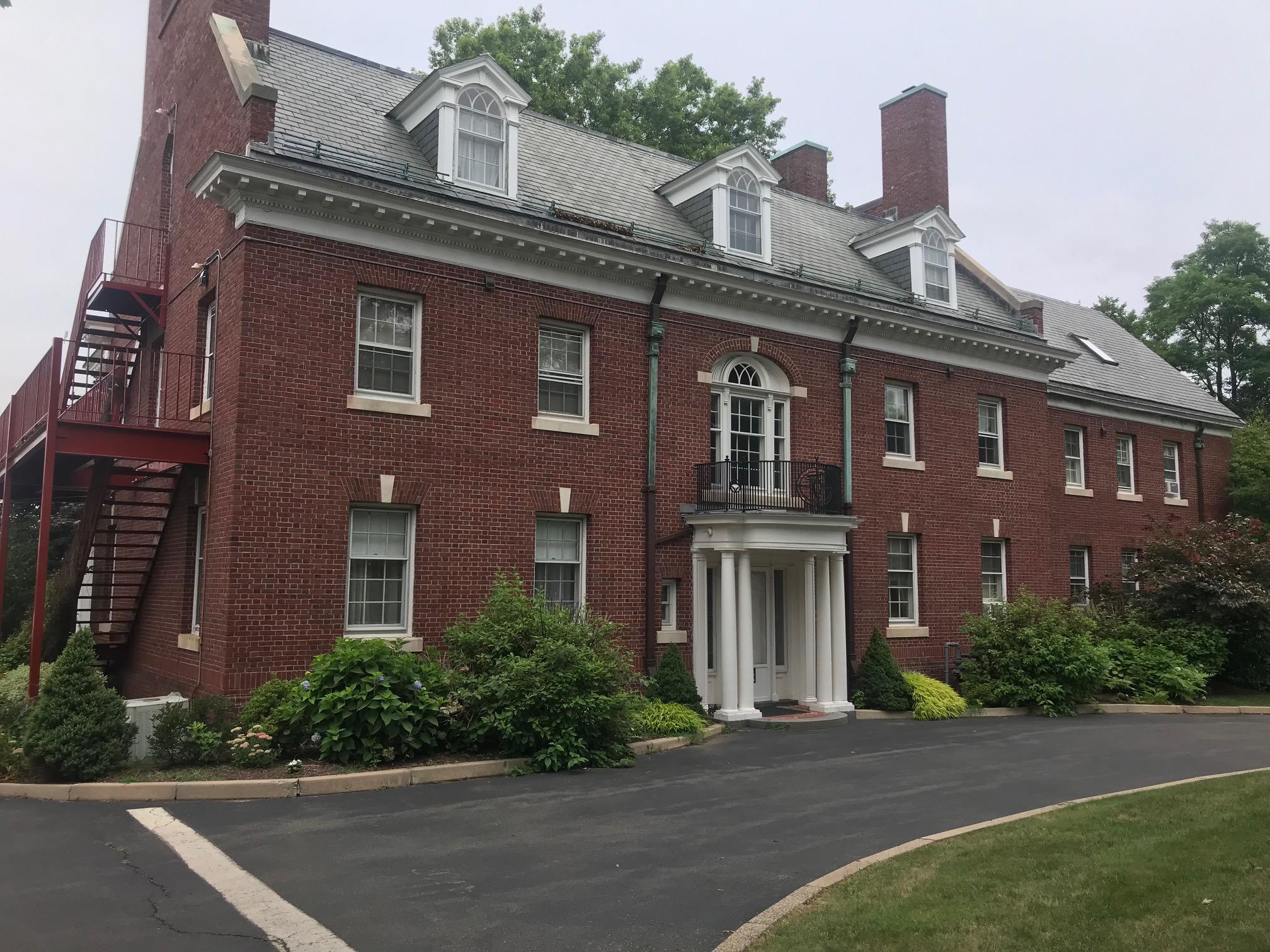 Albertus Magnus buys three buildings for housing, offices