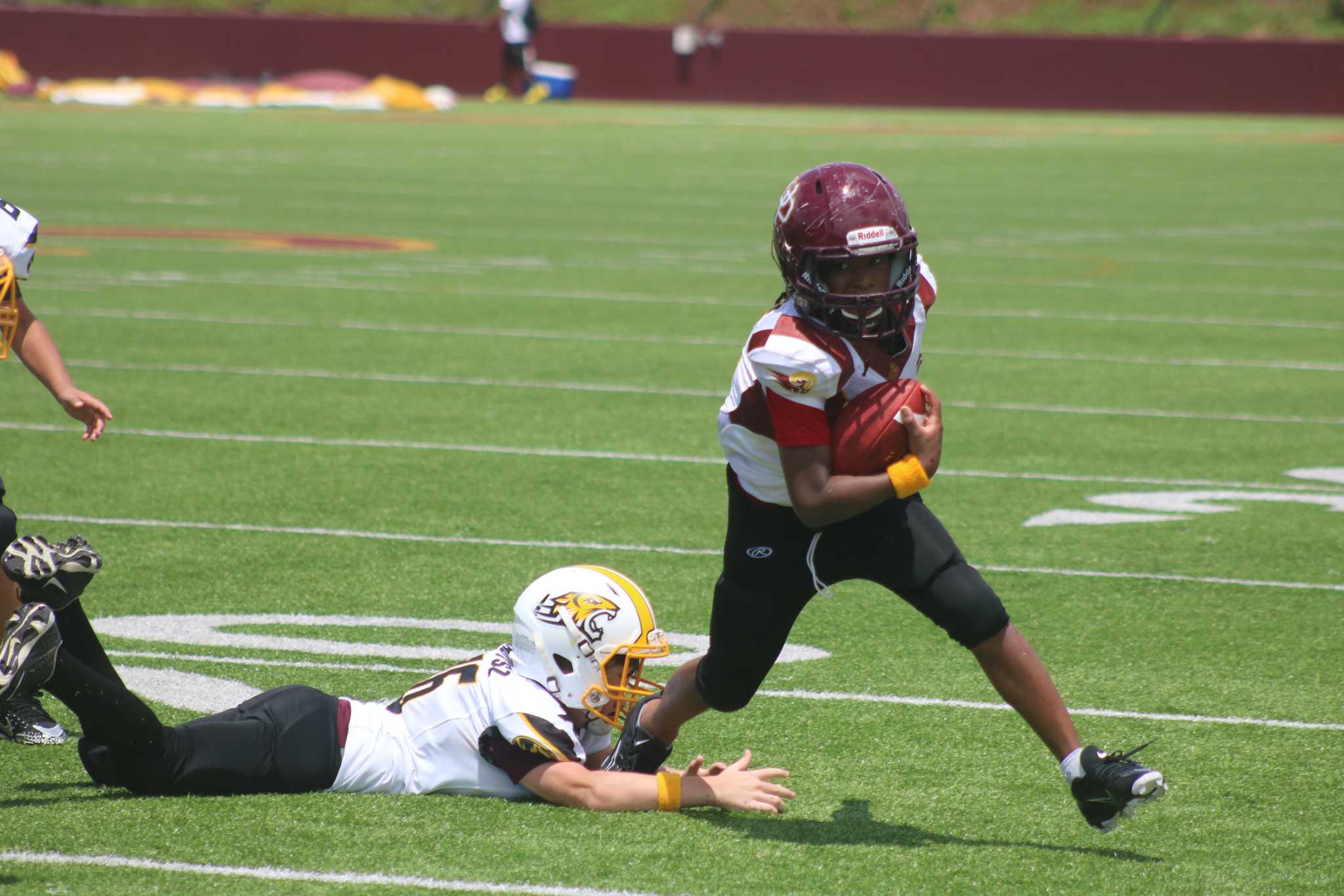 Deer Park Junior Rams overcome fumble troubles to down Tigers 30-20