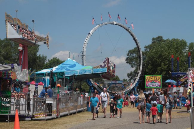 Families enjoy the midway at Mecosta County fair