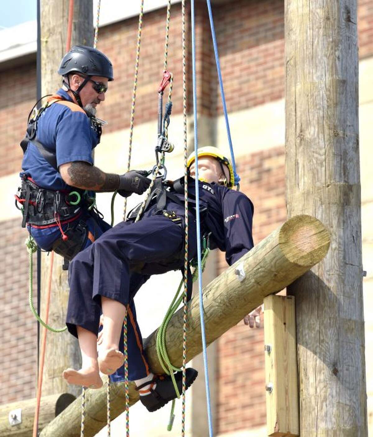 Utility, prisons start tree-trimming job program for inmates