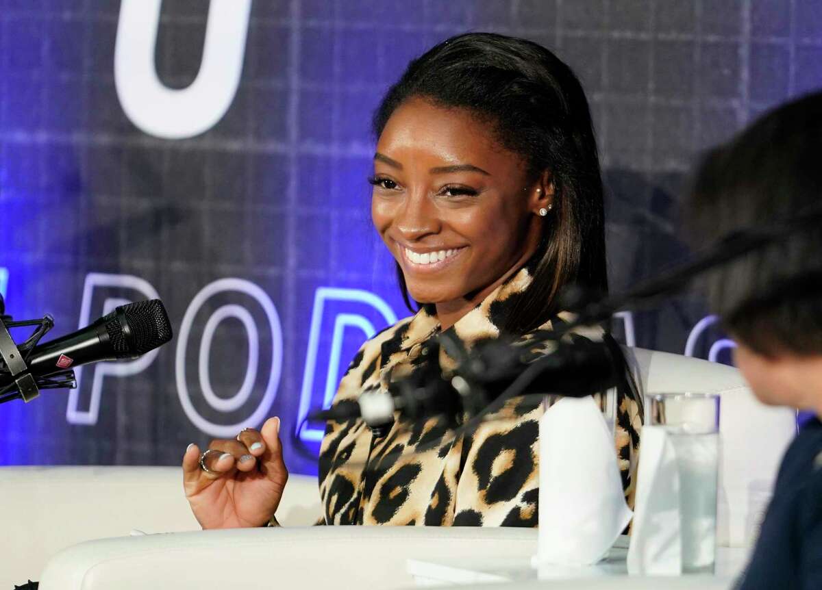 Simone Biles talks to students about money at Houston event