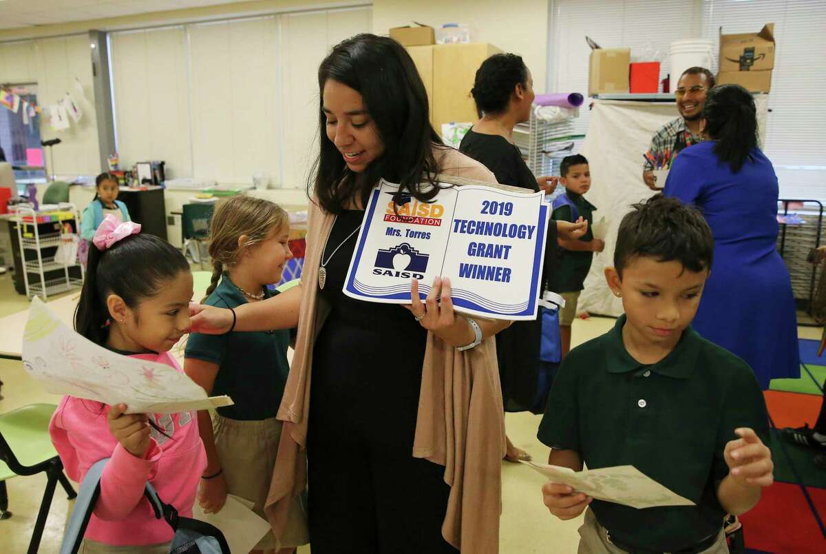 Teachers and staff surprised with grants — and Bonham Academy has 11 of ...