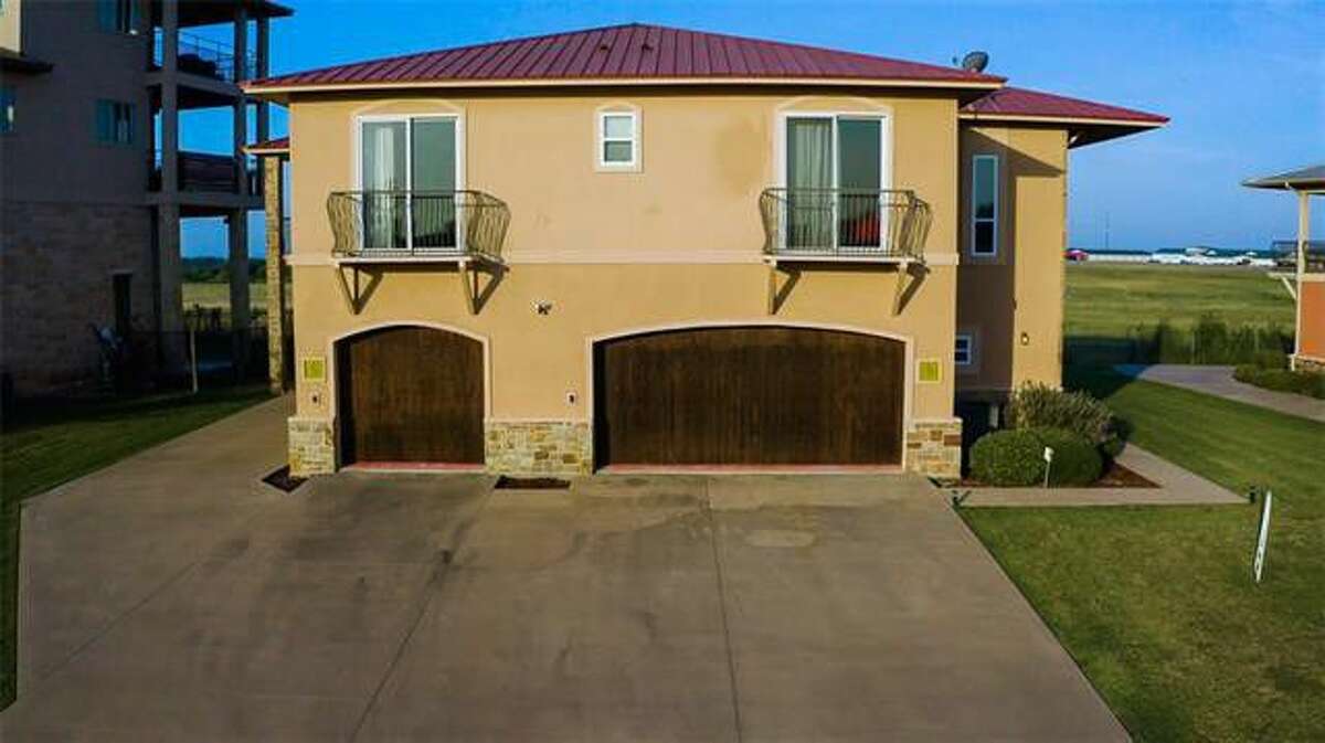 North Texas home has a race track for a backyard, and six-car garage ...