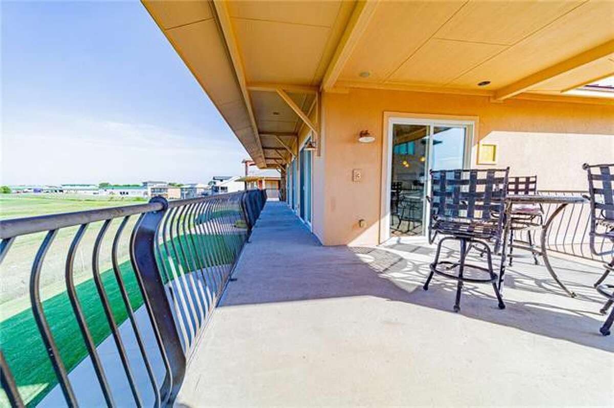 North Texas home has a race track for a backyard, and six-car garage ...