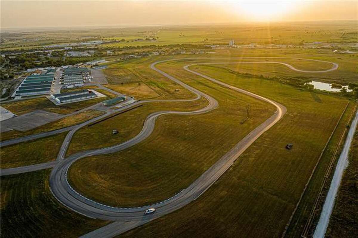 North Texas home has a race track for a backyard, and six-car garage ...