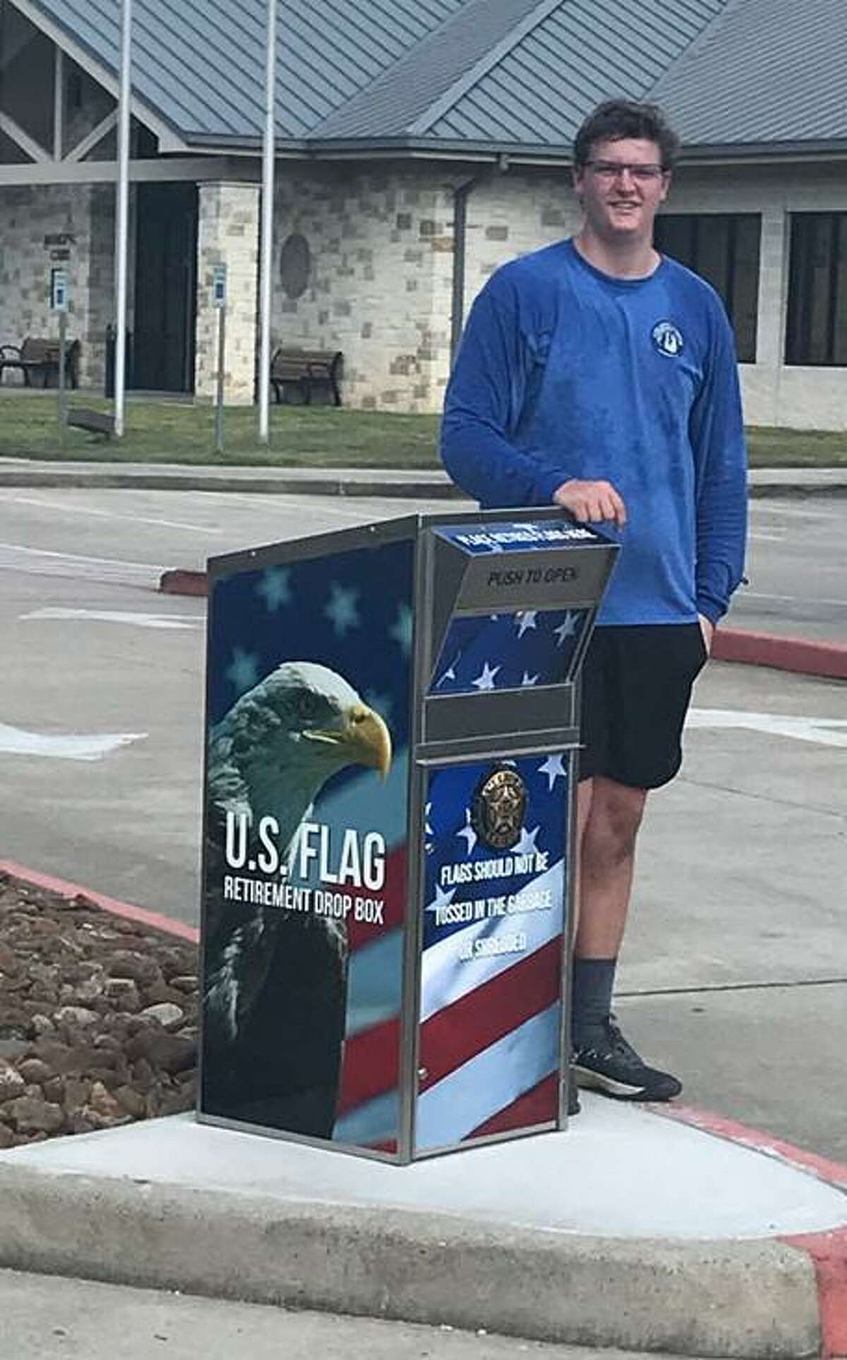 Boy Scout adds flag deposit box at library to earn his Eagle rank