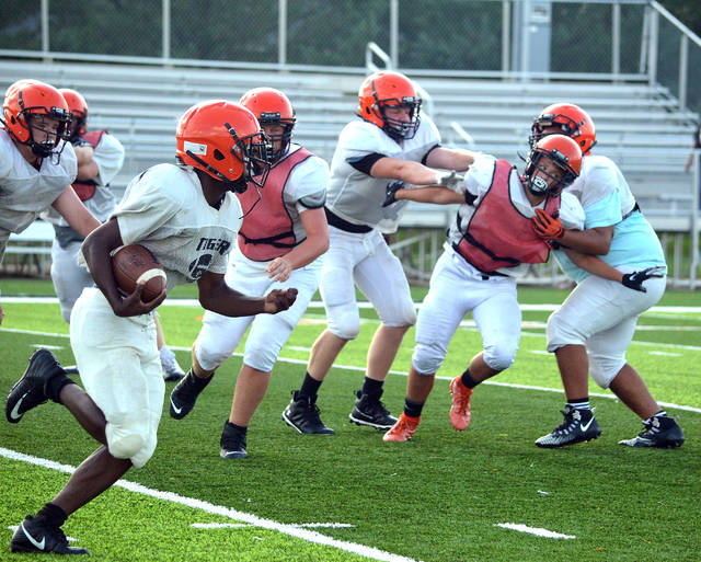 FOOTBALL: Tigers tune up for season