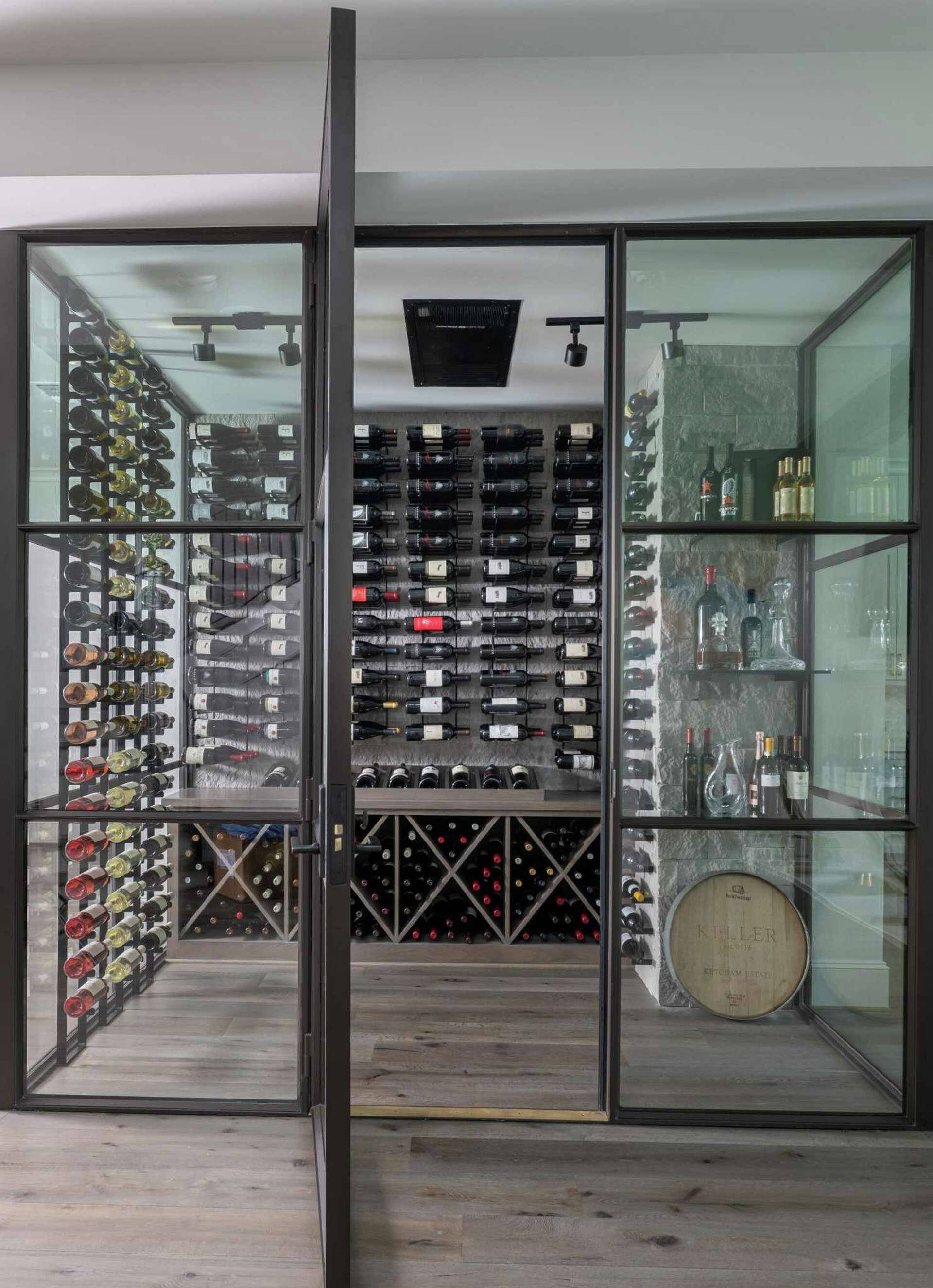 Homeowners put their passion on display in glass-enclosed wine room