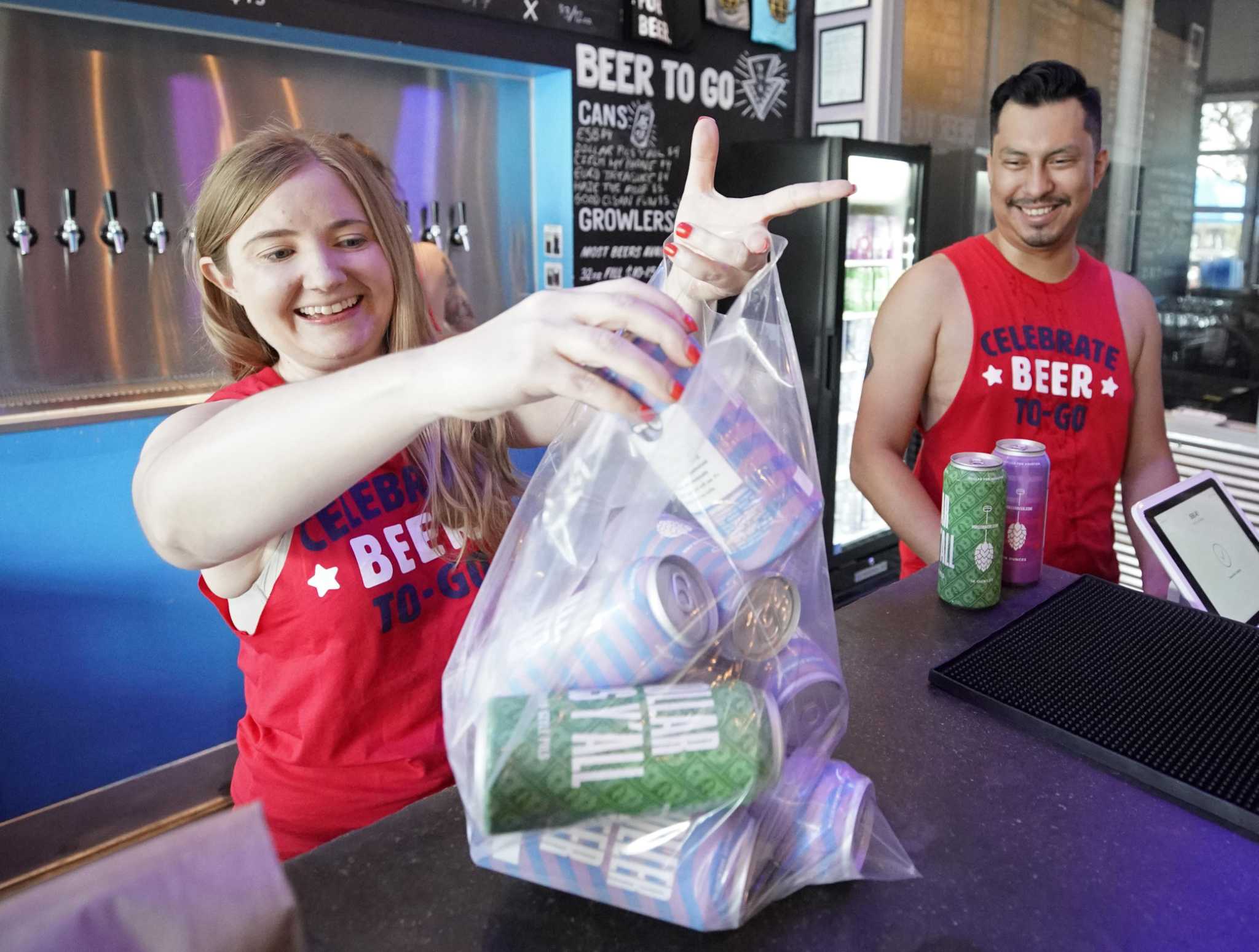 Houston beer enthusiasts eagerly take their suds to go for the first time