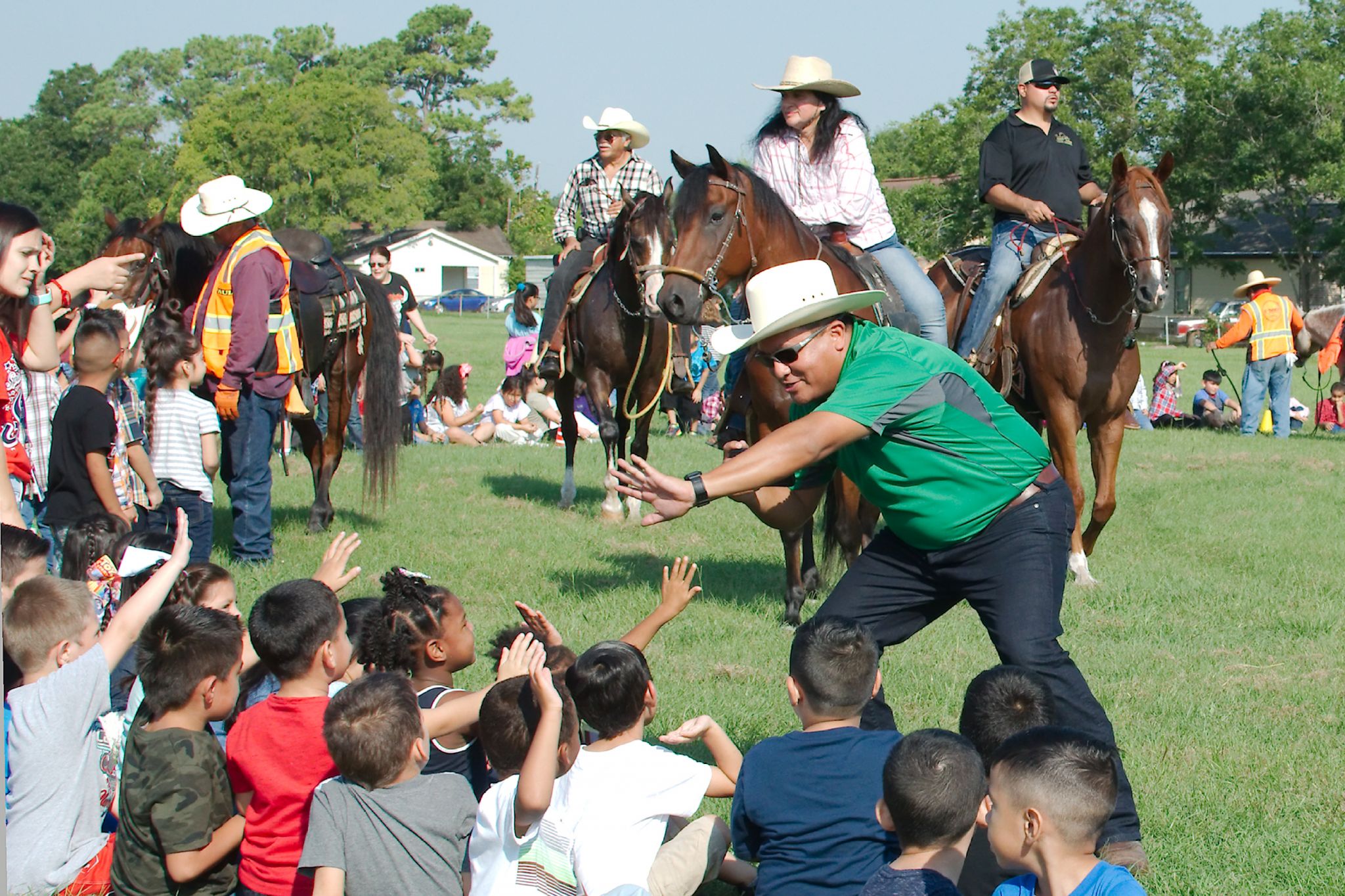 Pasadena ISD officials hitch up with rodeo trail ride