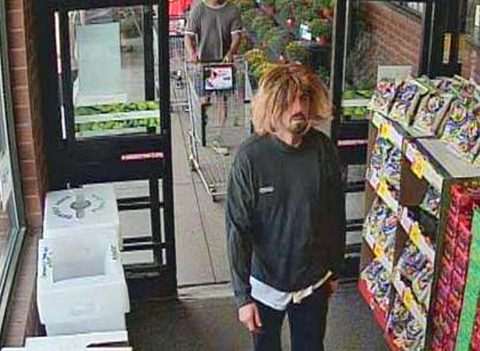 Cops seeking wig-wearing bank robber