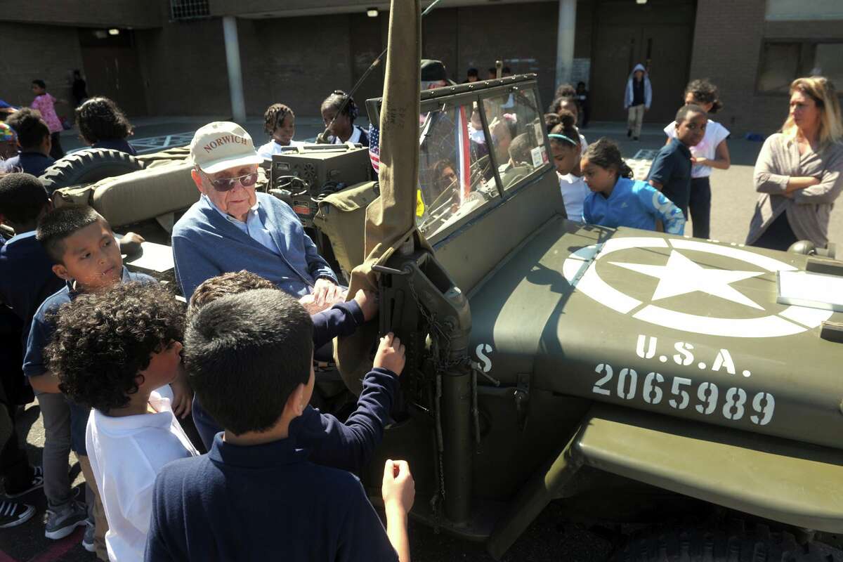 Restored WWII Jeep, veterans, bring history to Curiale students