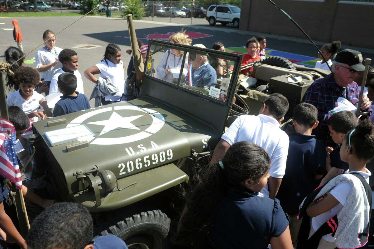 Restored WWII Jeep, veterans, bring history to Curiale students