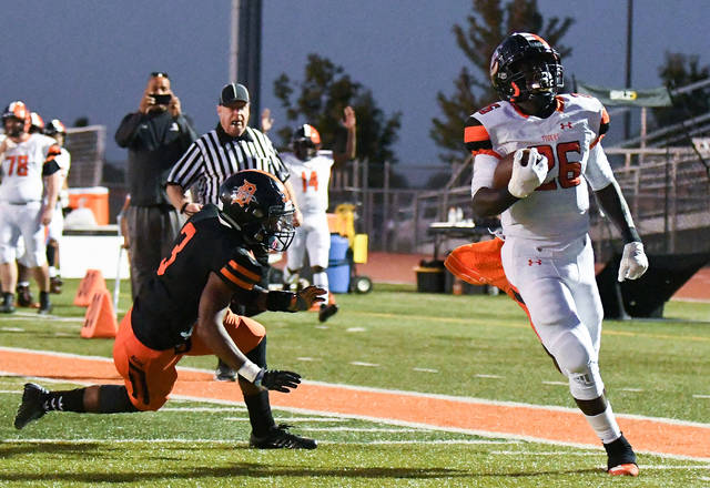 FOOTBALL: Tigers run all over Barbs