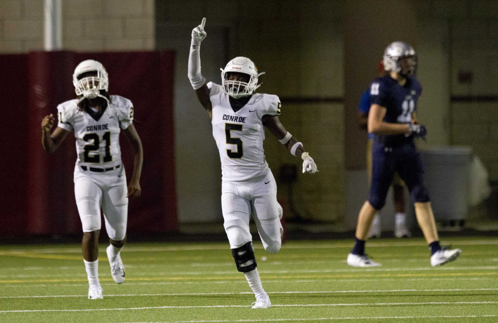 FOOTBALL: Conroe wins district opener for first time in decade