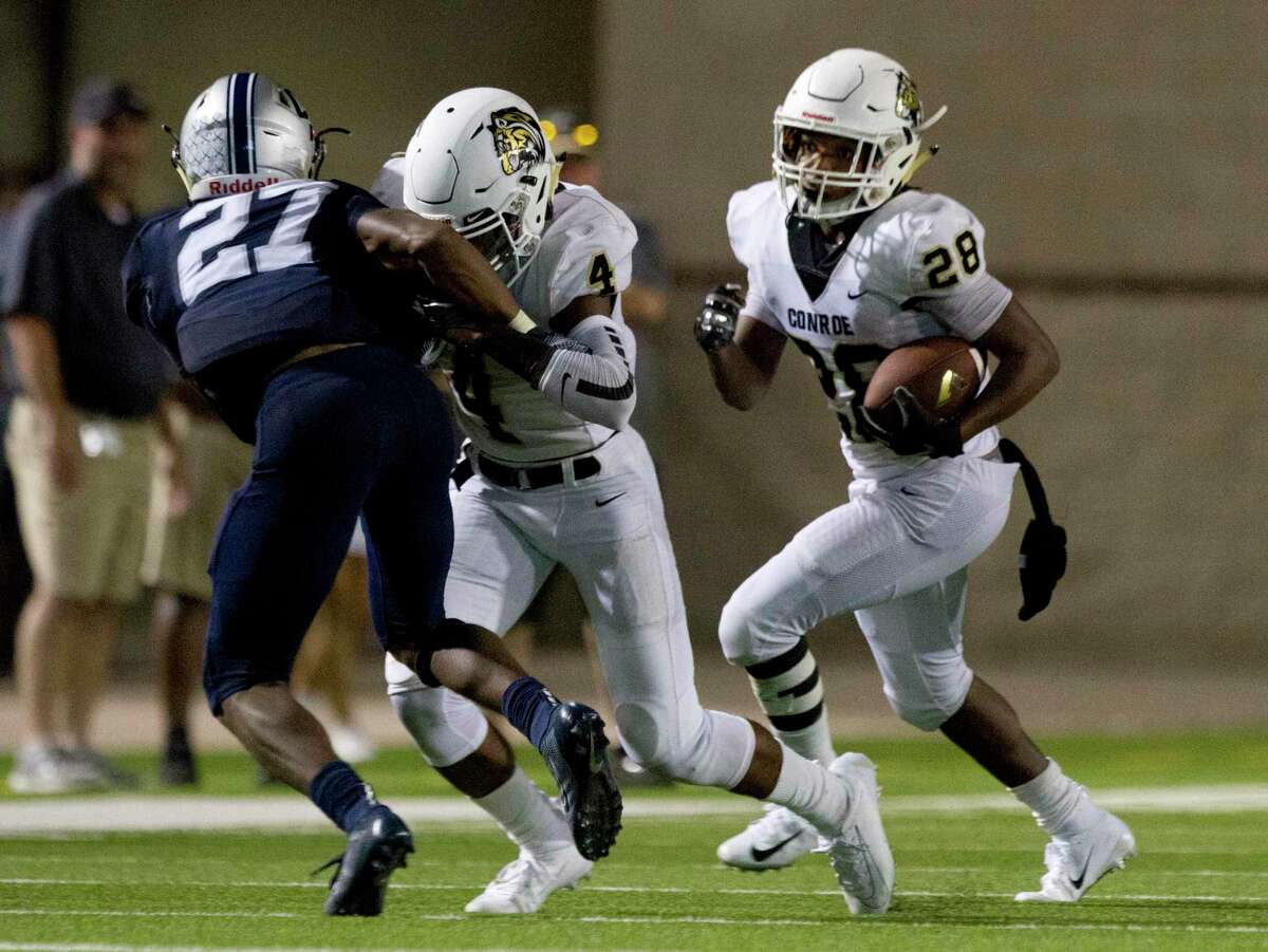 FOOTBALL: Conroe wins district opener for first time in decade