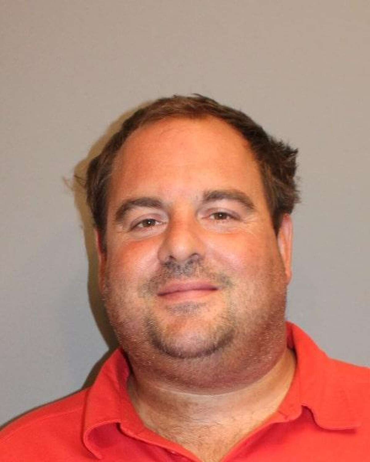 Norwalk man accused of attacking woman in front of child