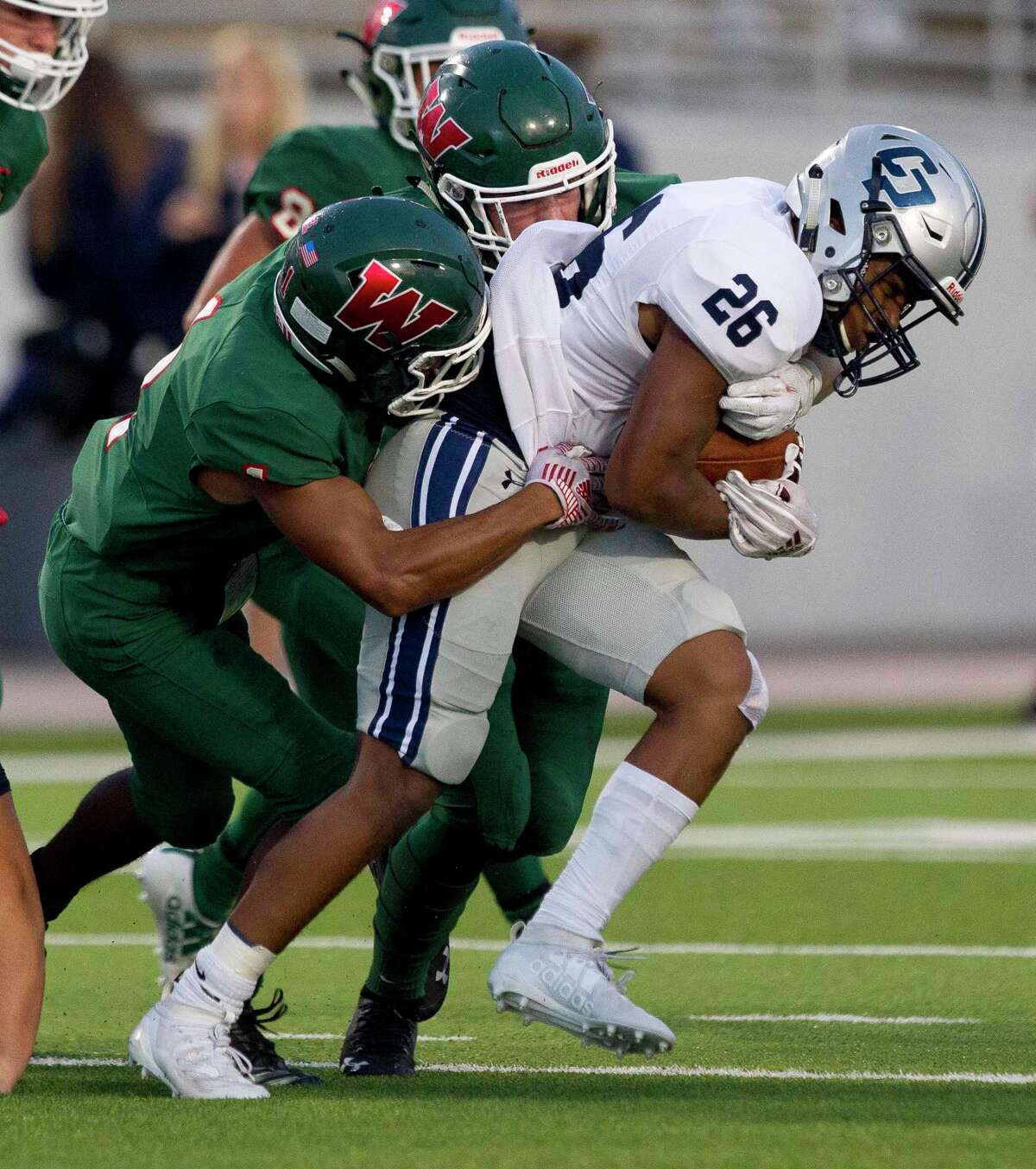 FOOTBALL: The Woodlands rolls past rival College Park