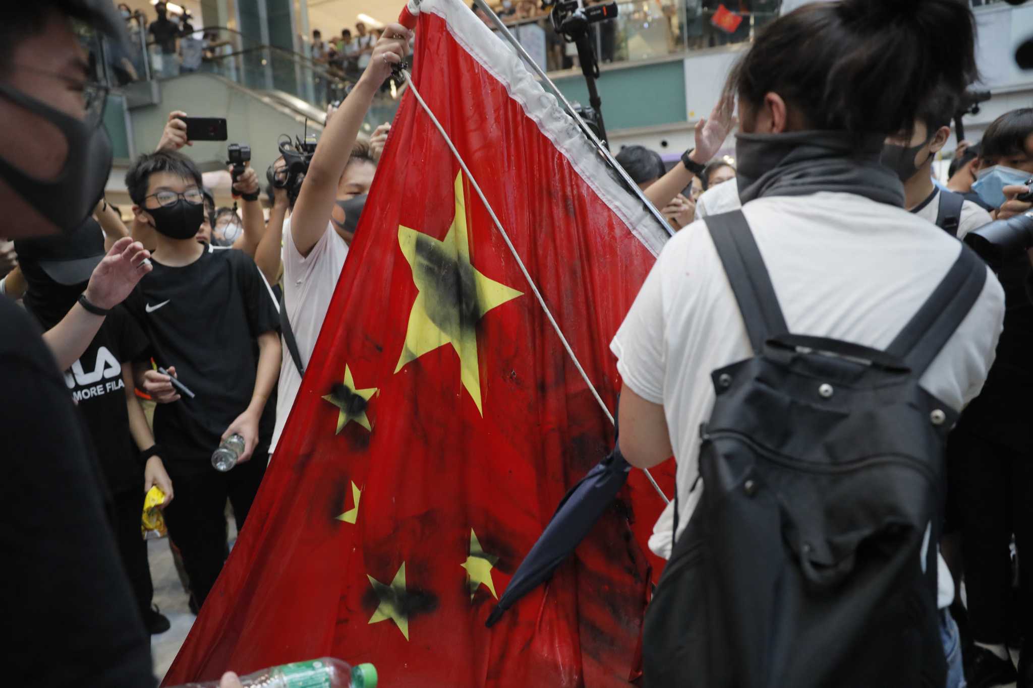 Protesters Trample Chinese Flag