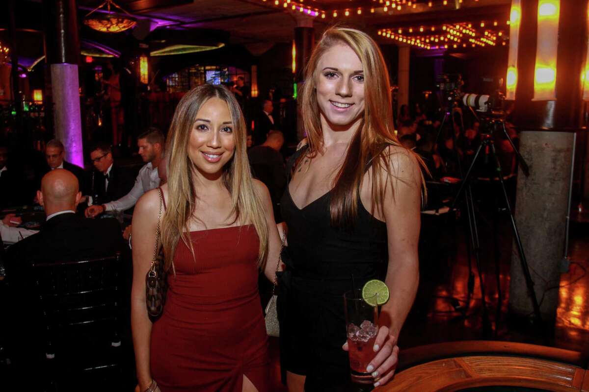 Former Texans stars channel their inner 007 for Wade Smith's annual celebrity poker tournament