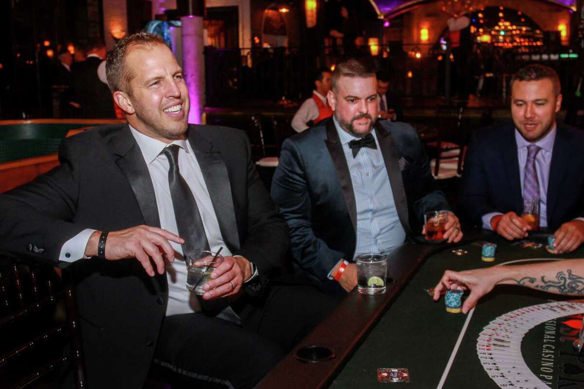 Former Texans stars channel their inner 007 for Wade Smith's annual ...