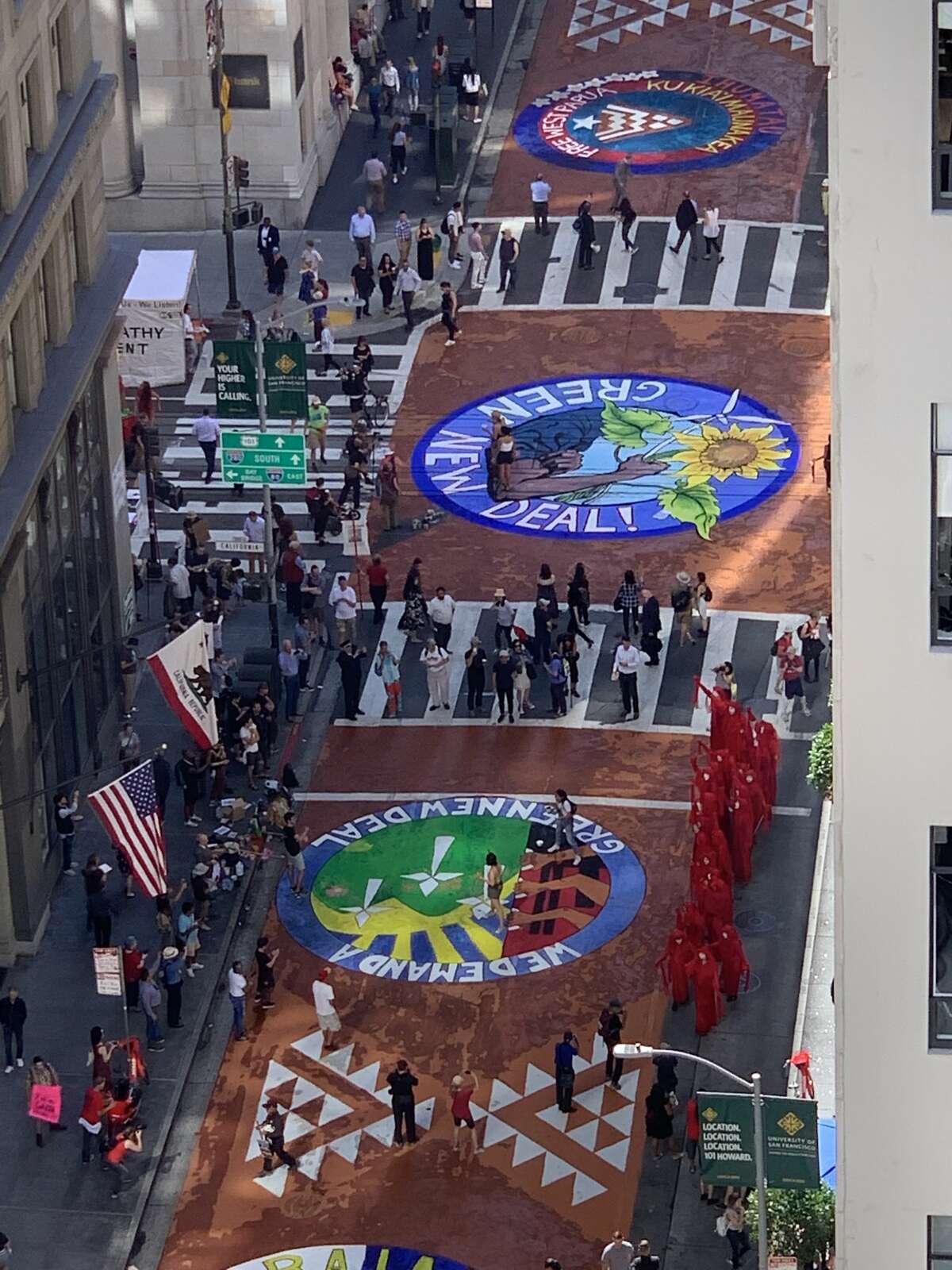 'It's spectacular': Climate activists paint stunning mural on two ...