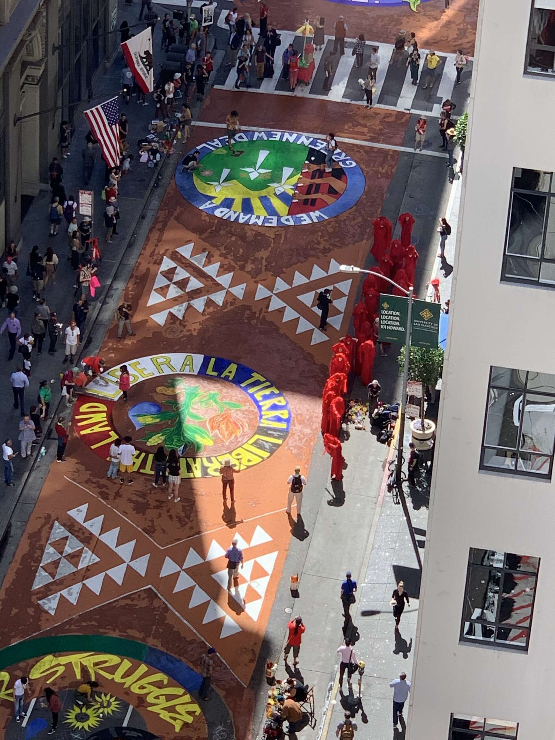 'It's spectacular': Climate activists paint stunning mural on two ...