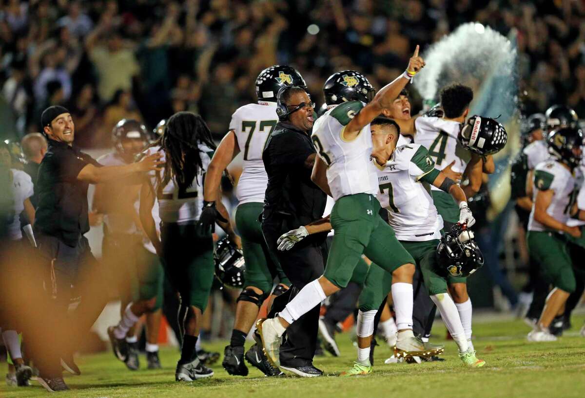 Titans fend off Dragons, collect first district win