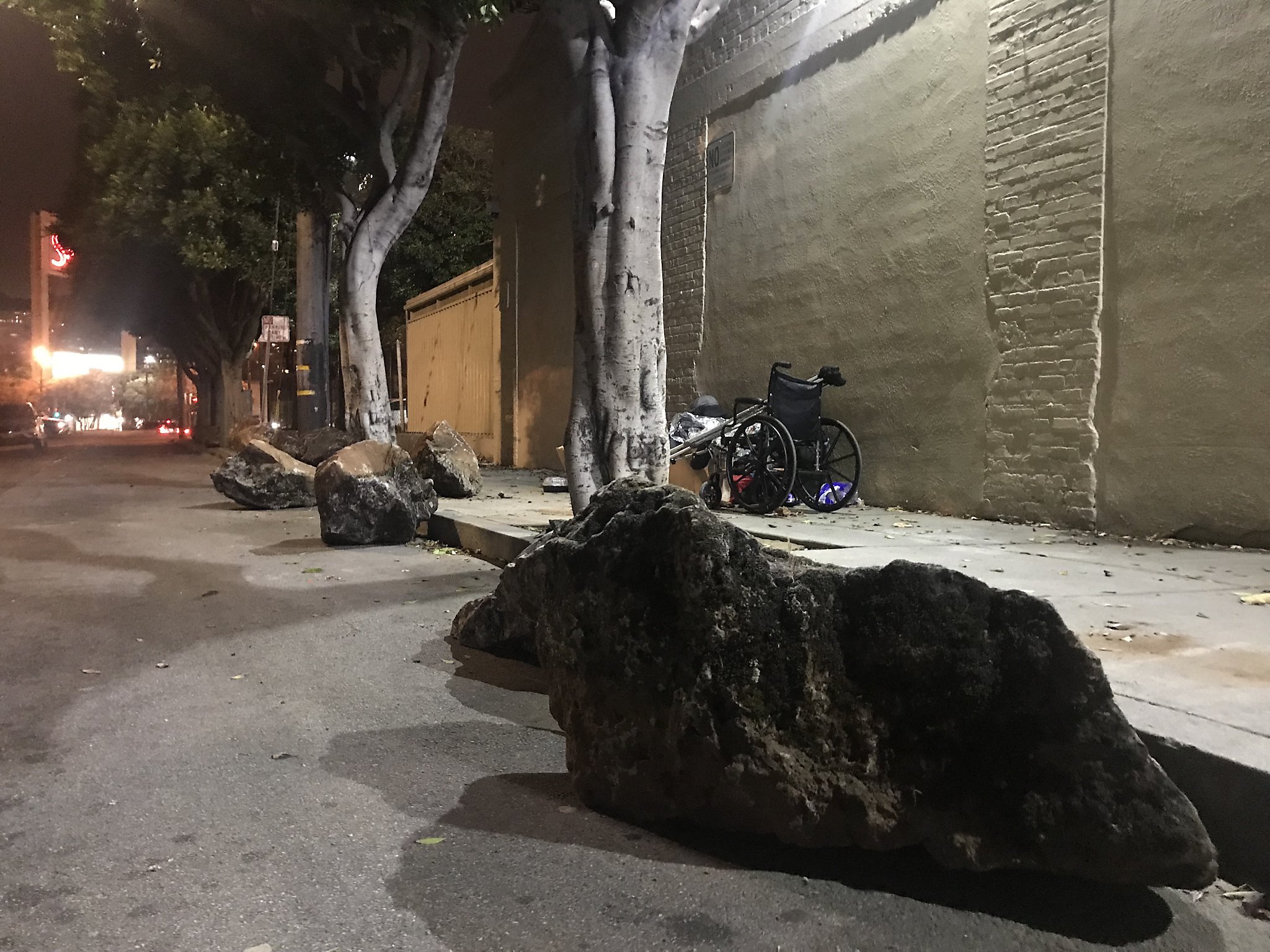 Boulders to deter homeless people on SF streets get rolled off the sidewalk