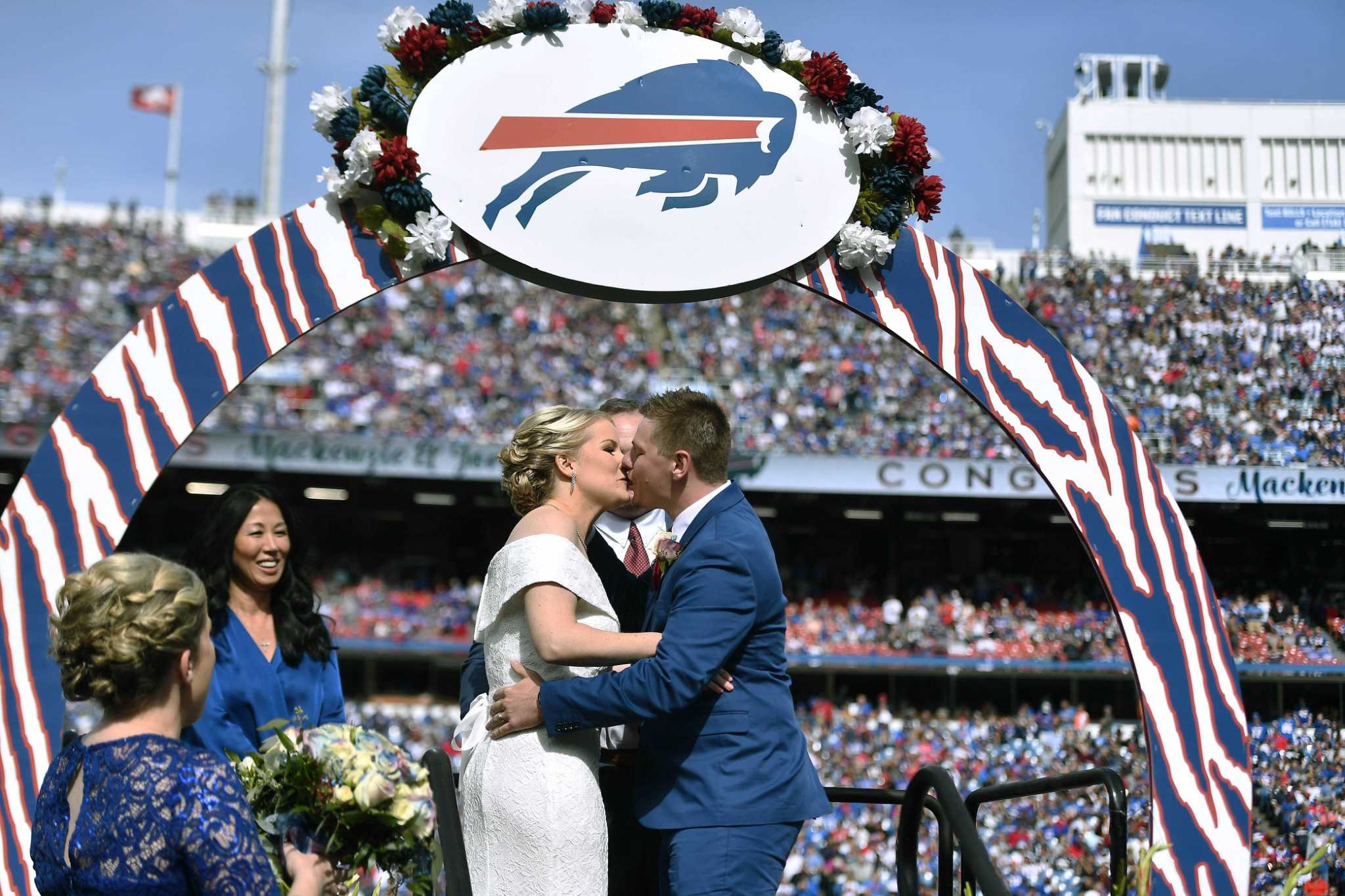 Here comes the bride: Football and wedding at an NFL stadium