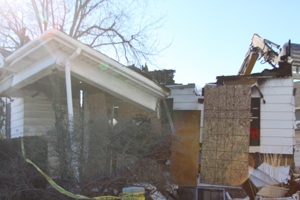 Home torn down Tuesday after burning in December